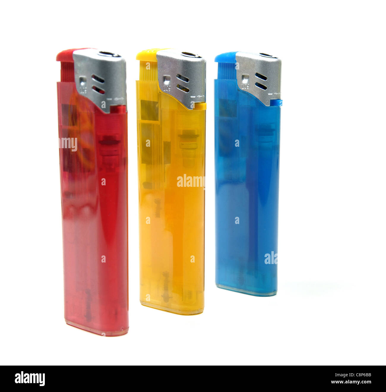 Three colorful lighters on white background Stock Photo - Alamy
