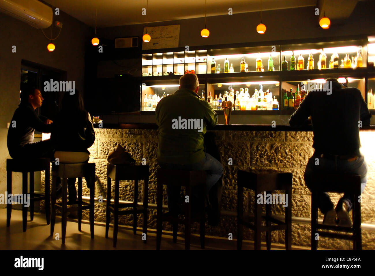 People sitting in the Radio Bar, formally Beit Aneeseh located in the ...