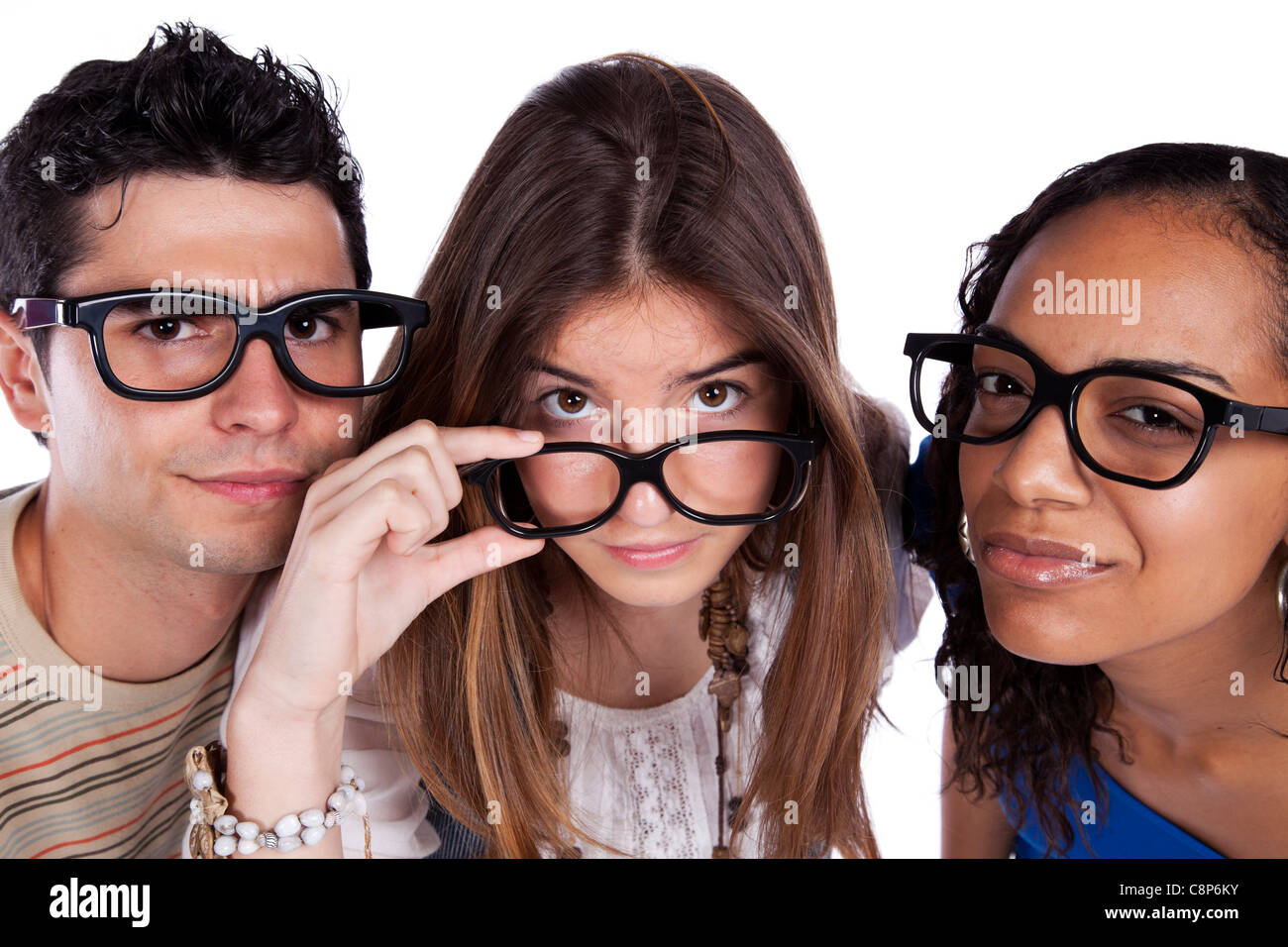 Three smart student friends looking with eyeglasses Stock Photo - Alamy