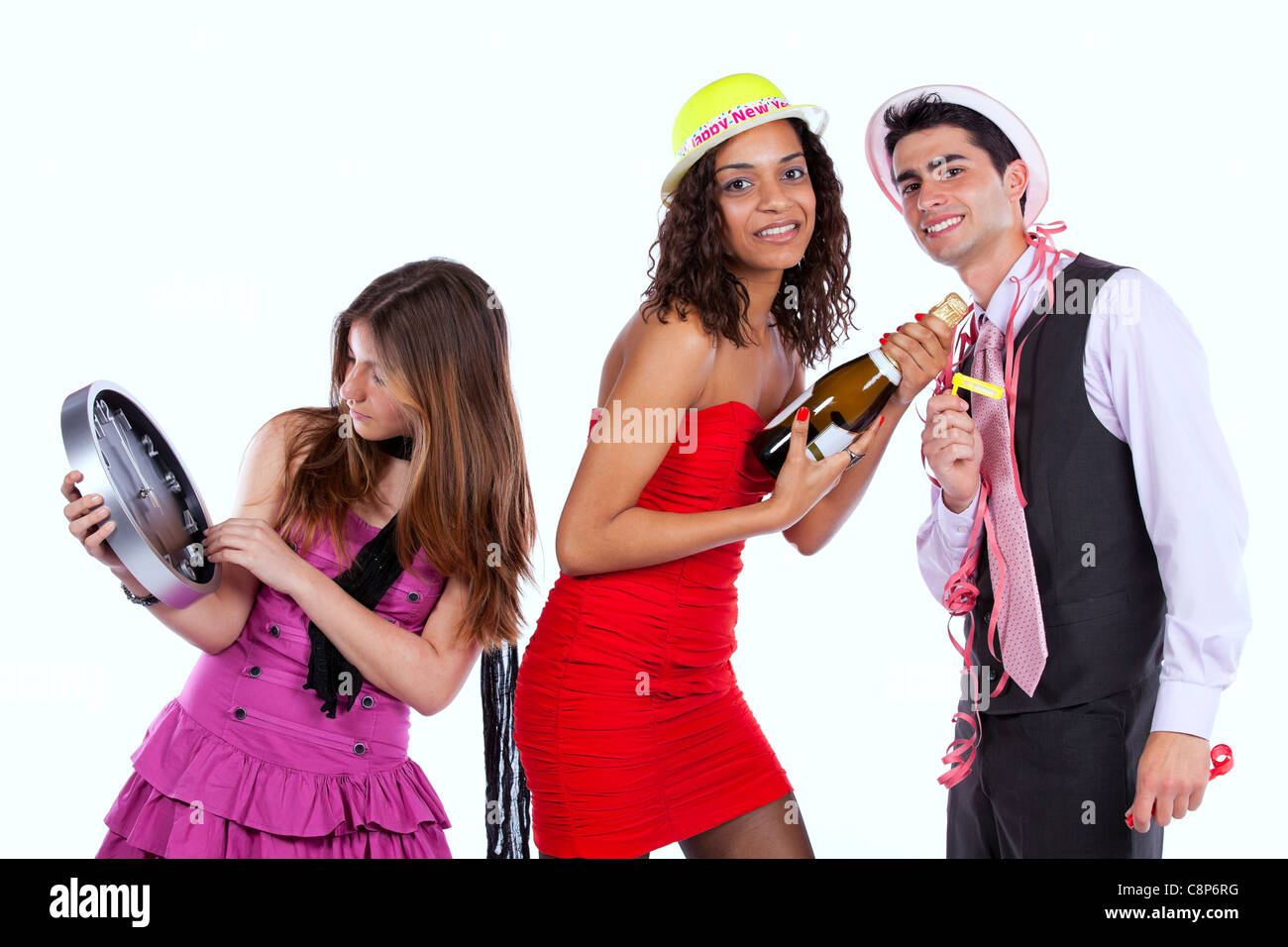 Three happy young friends celebrating the New Year party (isolated on ...