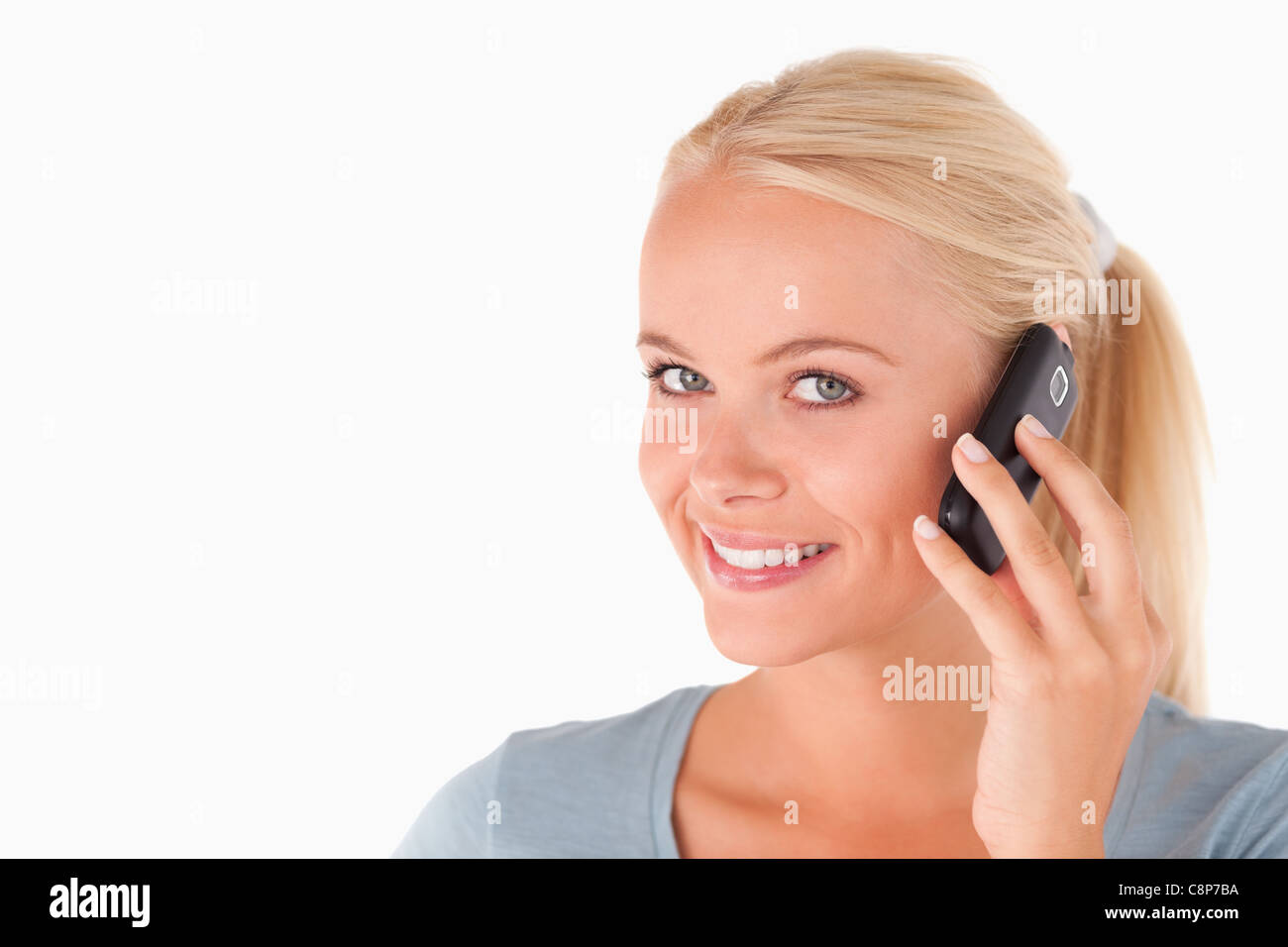 Smiling woman on the phone Stock Photo - Alamy