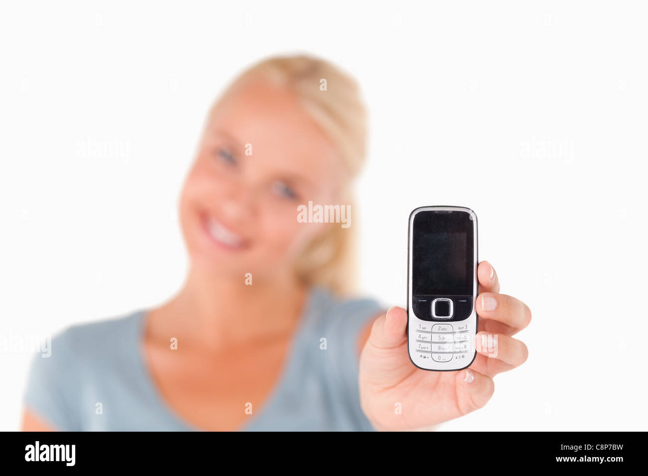 Woman showing phone Stock Photo - Alamy