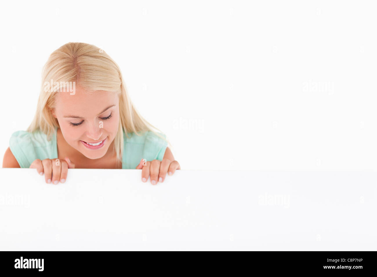 Woman looking at a whiteboard Stock Photo - Alamy