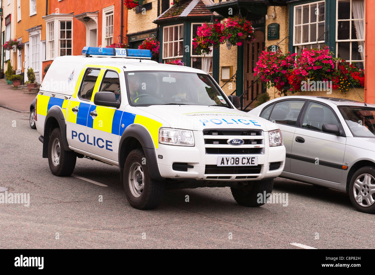 A police four wheel drive vehicle car in Lavenham , Suffolk , England ...