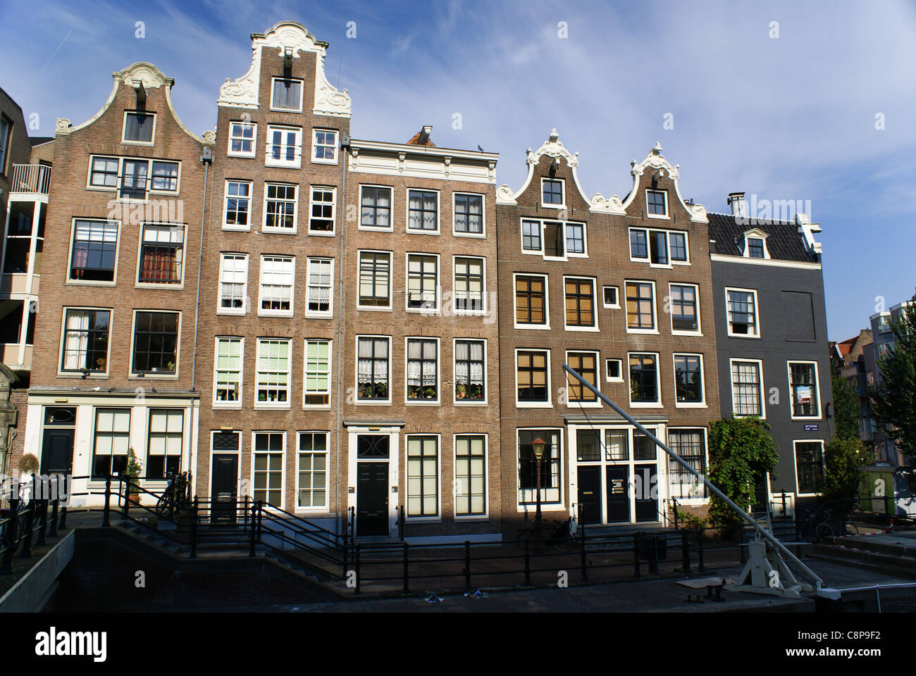 Typical Dutch houses in Amsterdam Stock Photo - Alamy