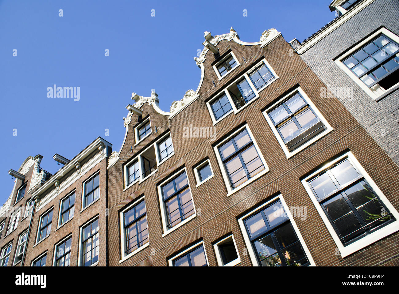 Typical Dutch houses in Amsterdam Stock Photo - Alamy