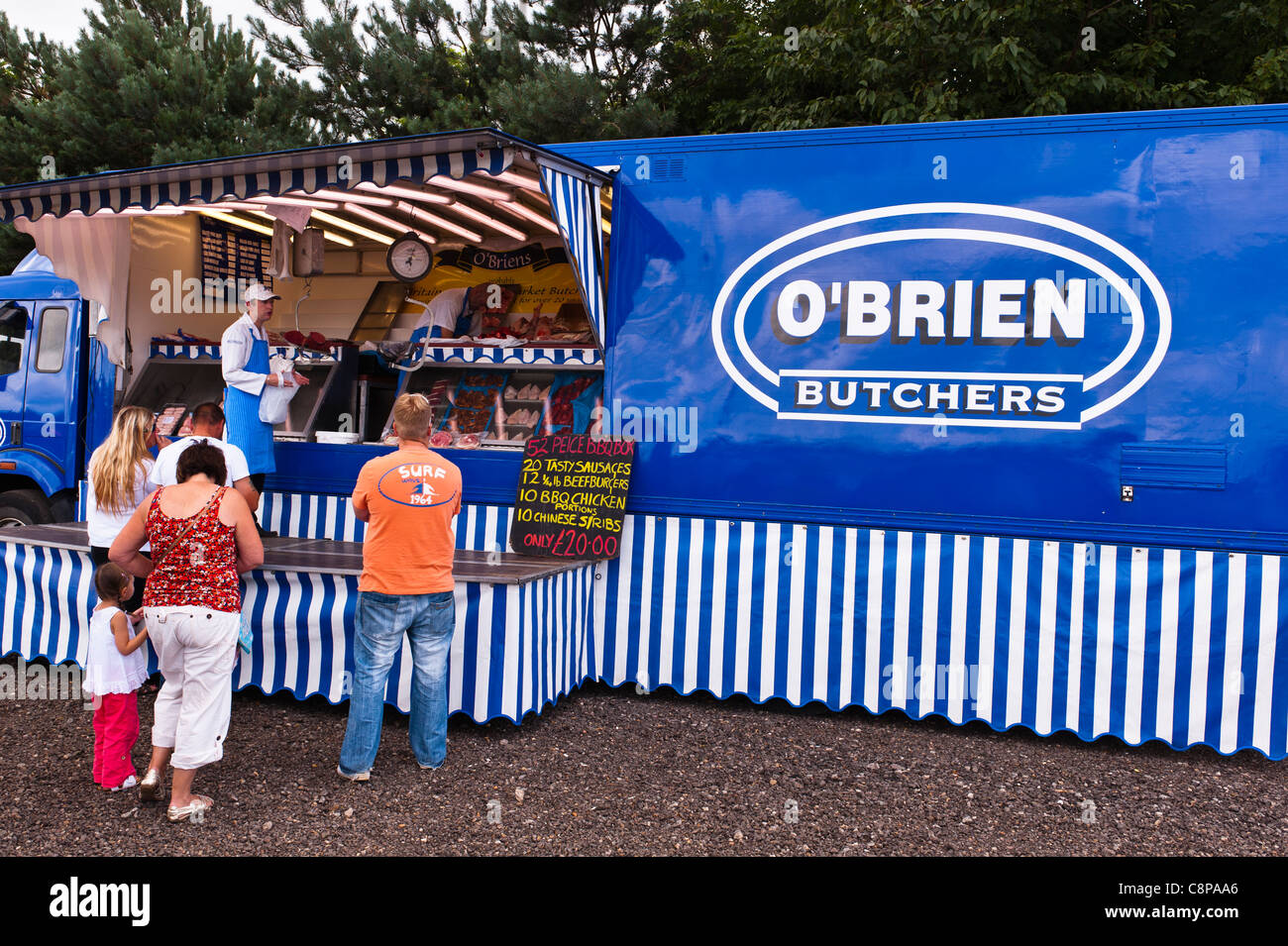 A butchers stall selling meat at a car boot sale in Suffolk , England ...
