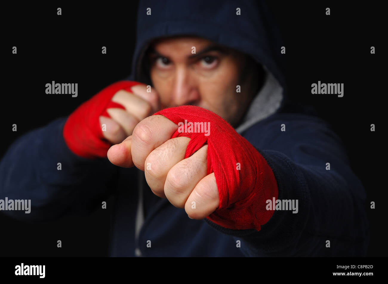 Fighter in training moment (focus on the first hand Stock Photo - Alamy