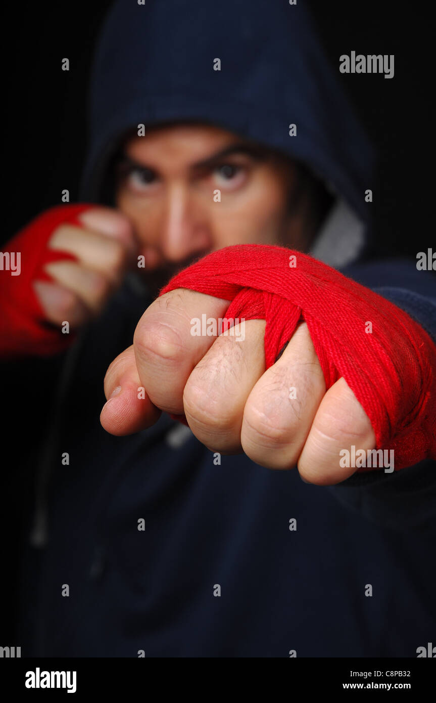 Fighter in training moment (focus on the first hand Stock Photo - Alamy