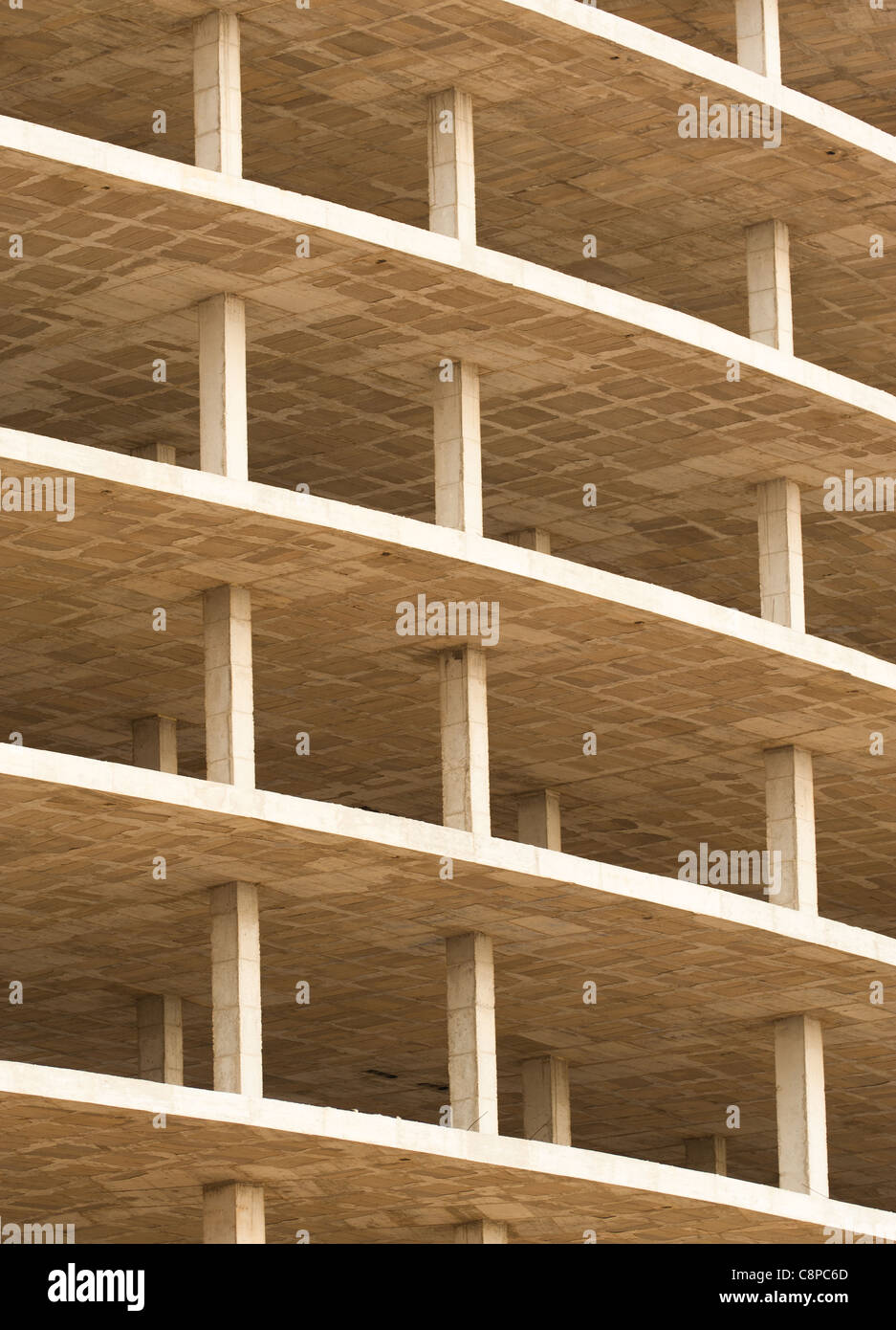 Unfinished high rise building concrete structure, a background Stock ...