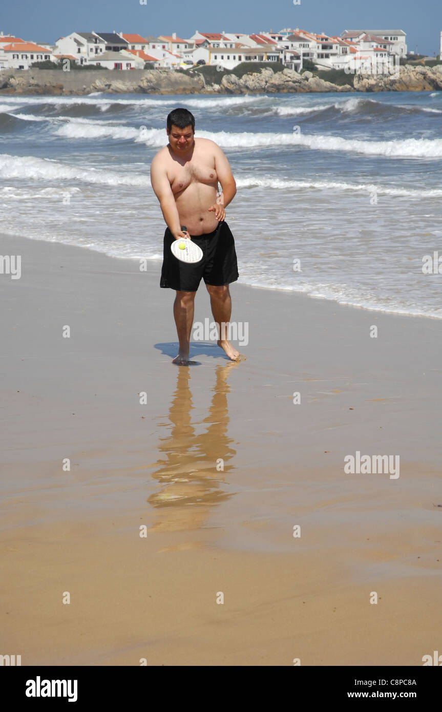Fat man on beach hi-res stock photography and images - Alamy