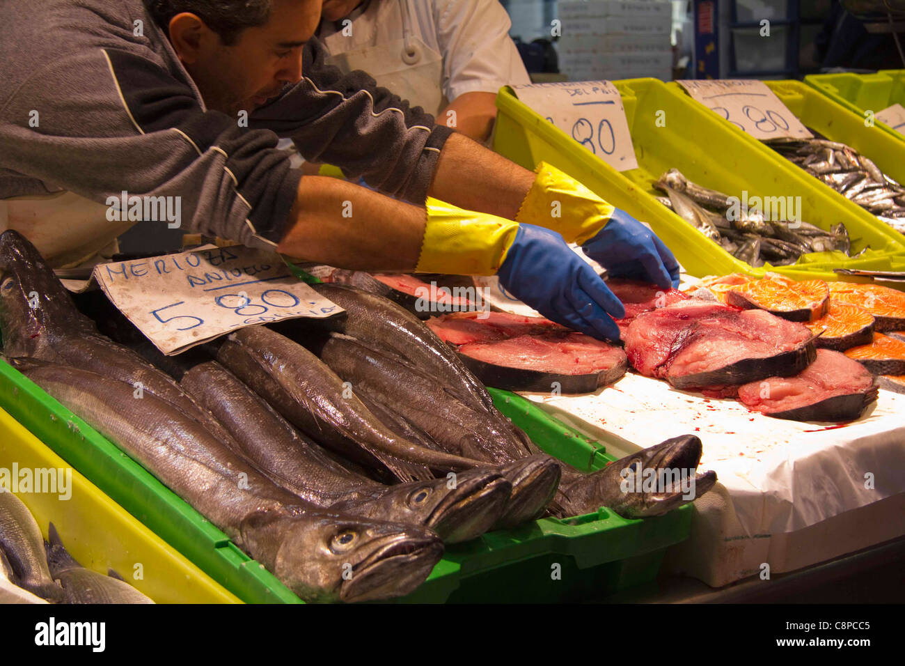 Selling fish at the Mercado de la Ribera market Bilbao Basque country ...