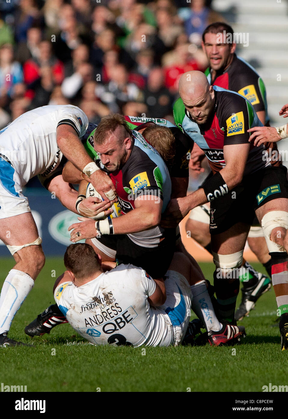 Exeter Chiefs John Andress tackles Harlequins prop Joe Marler in ...