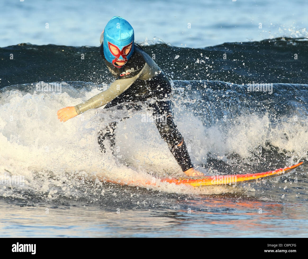 BOY SURFER IN LUCHA LIBRE MASK BLACKIE'S HALLOWEEN COSTUME SURF CONTEST ...