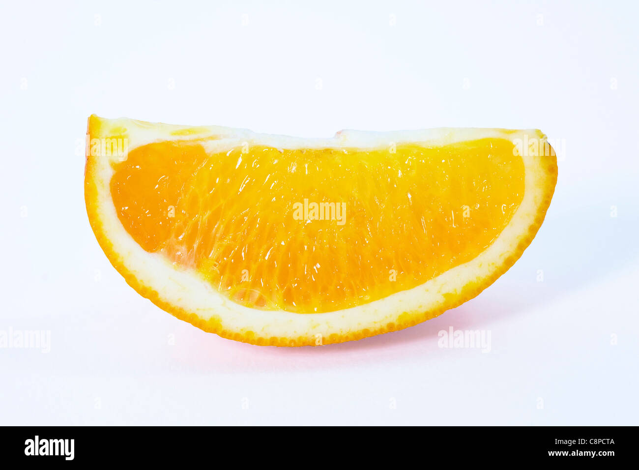 Citrus x sinensis. Orange slice on a white background Stock Photo - Alamy