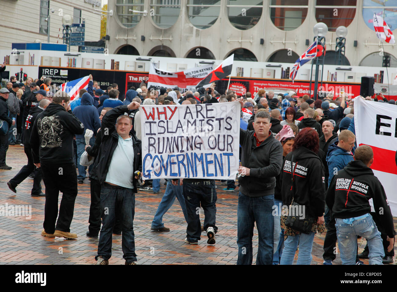 EDL members holding up banners for photographers. During the ...