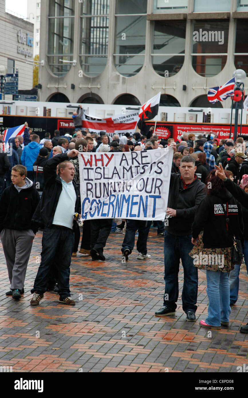 EDL members holding up banners for photographers. During the ...