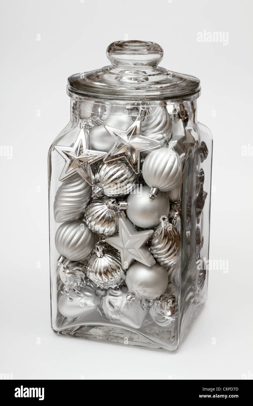 glass jar full of silver white Christmas bubbles Stock Photo - Alamy