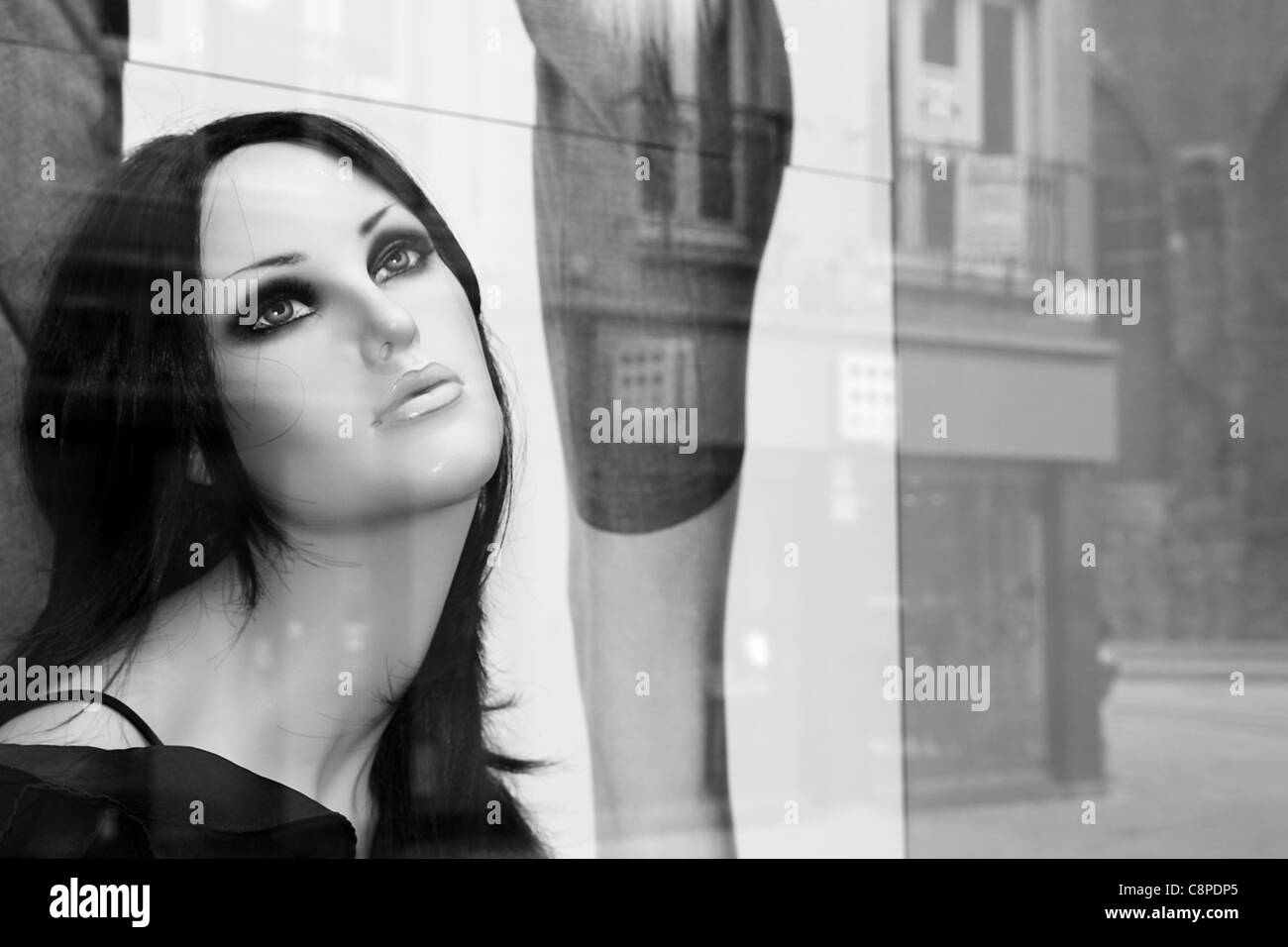 Shop window with dummy Stock Photo - Alamy