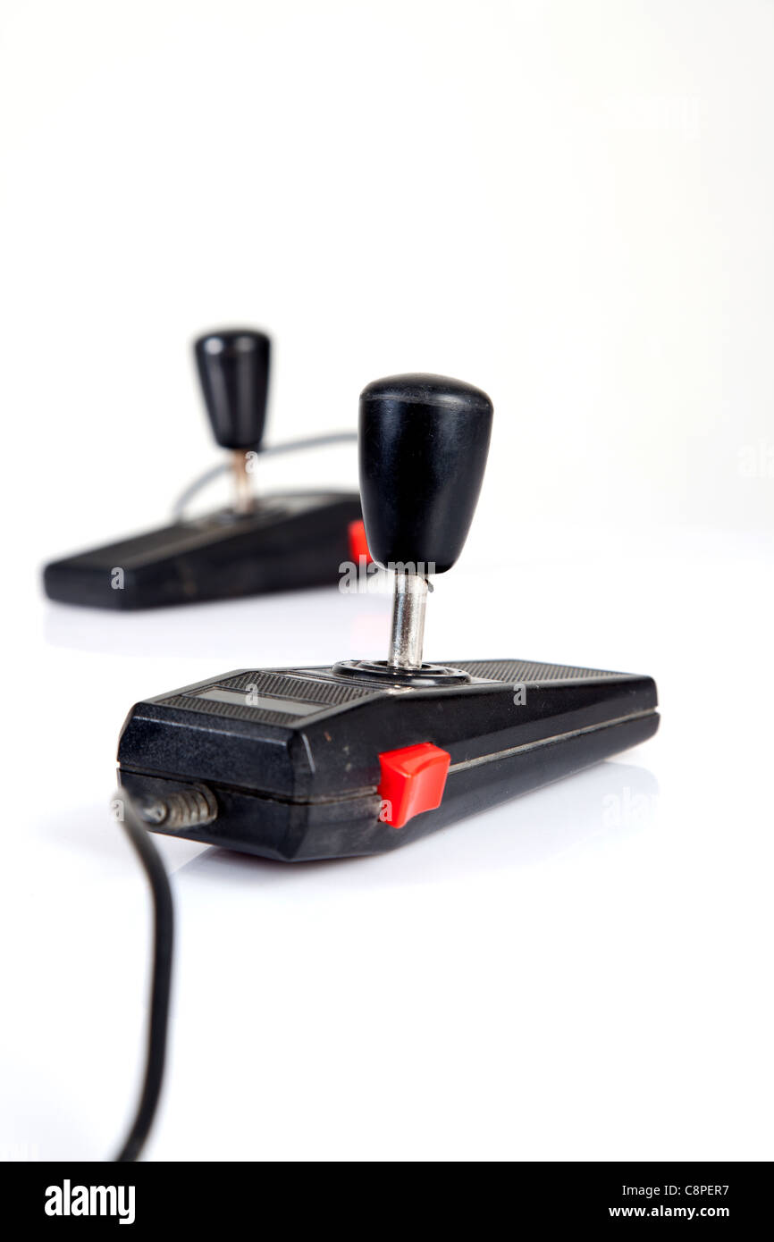 Pair of retro game console joystick Stock Photo - Alamy