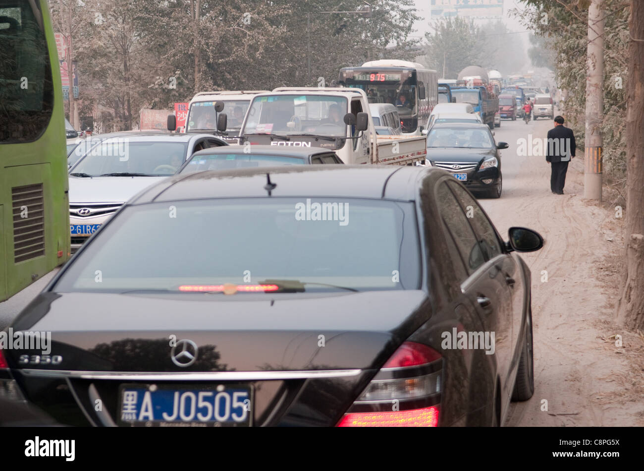 Hundreds of cars are stuck in gridlock, in the North of Beijing, as ...
