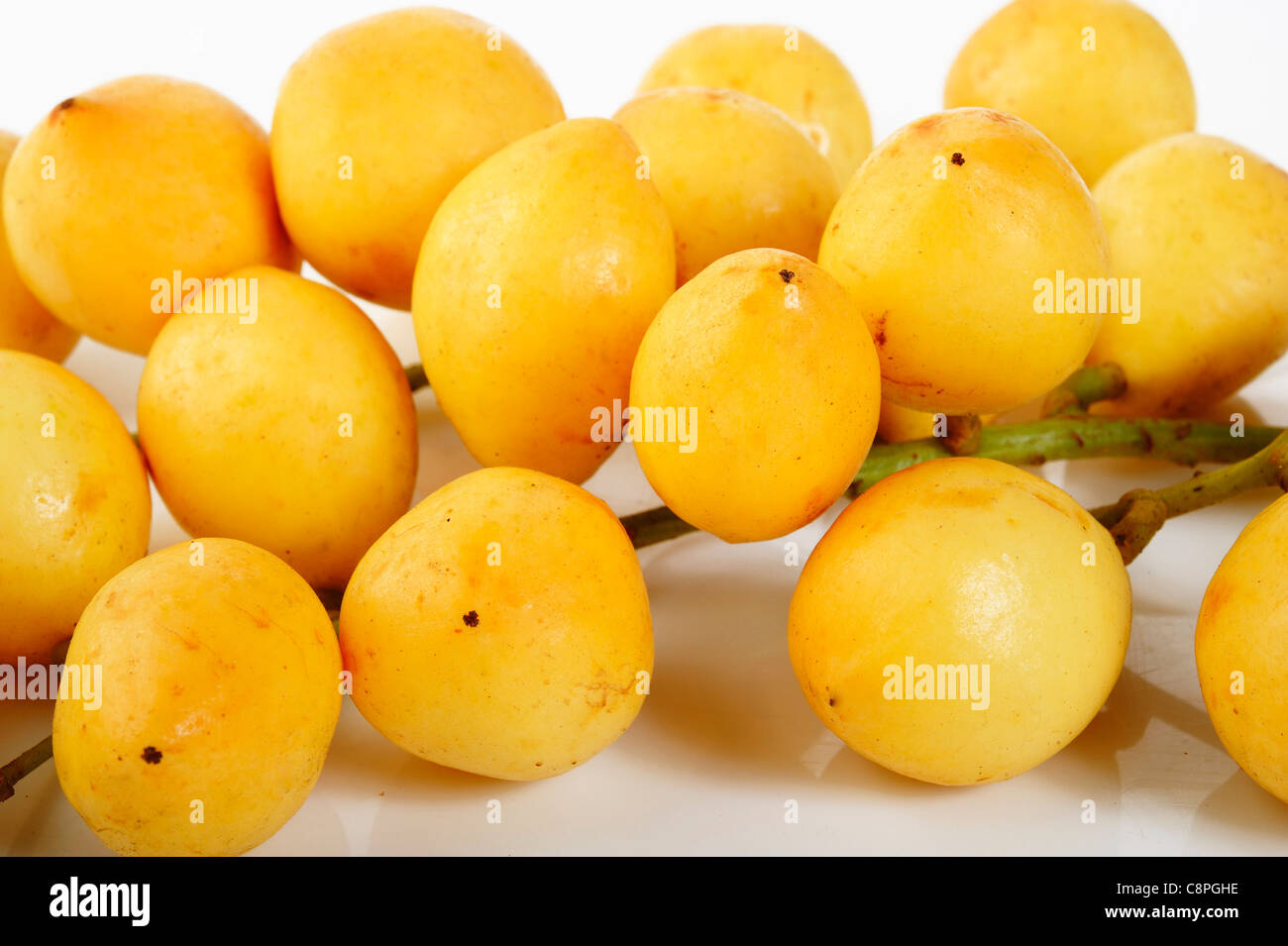 Burmese grape on white Stock Photo - Alamy
