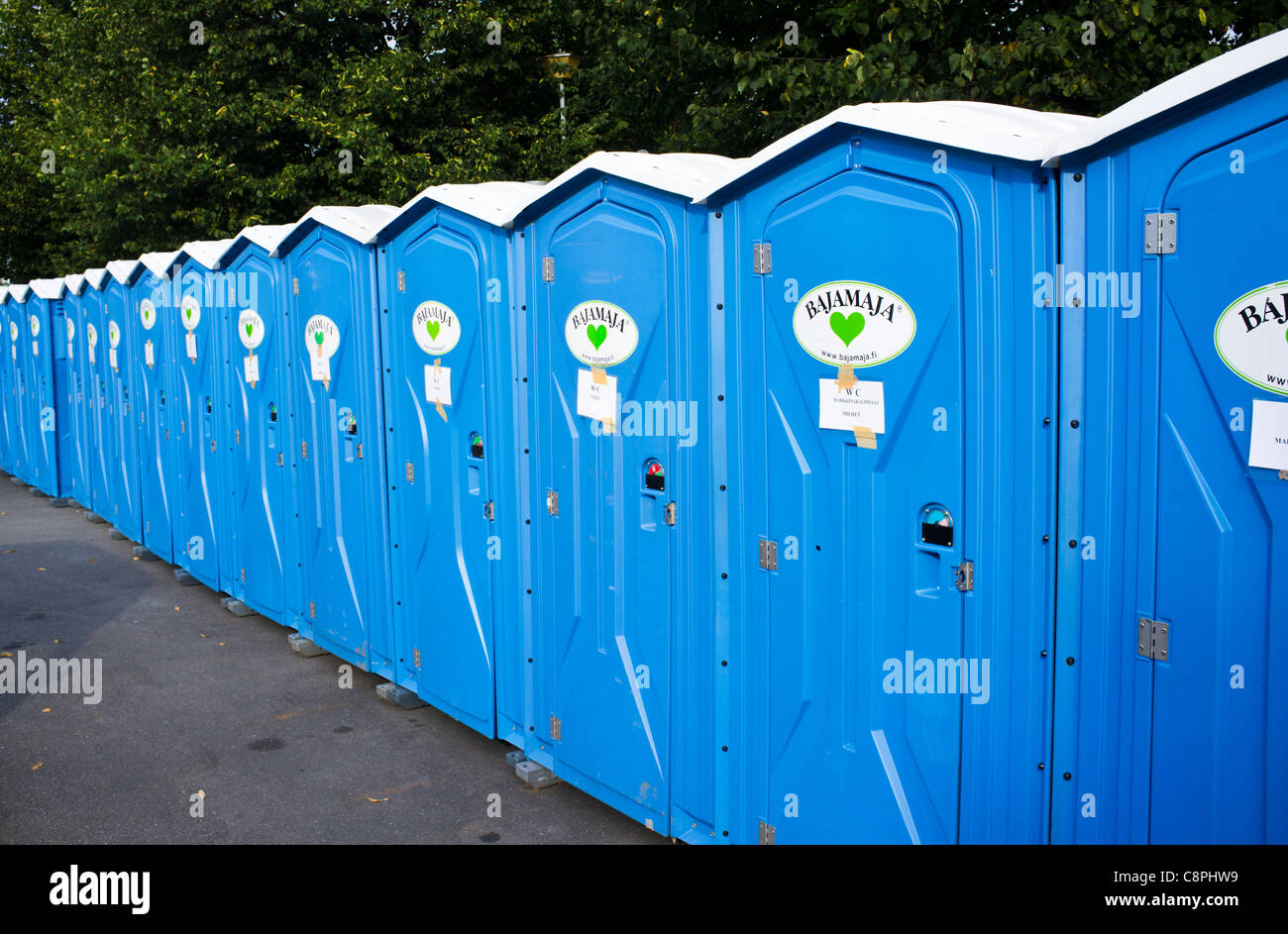 Row of blue outhouses , Finland Stock Photo - Alamy