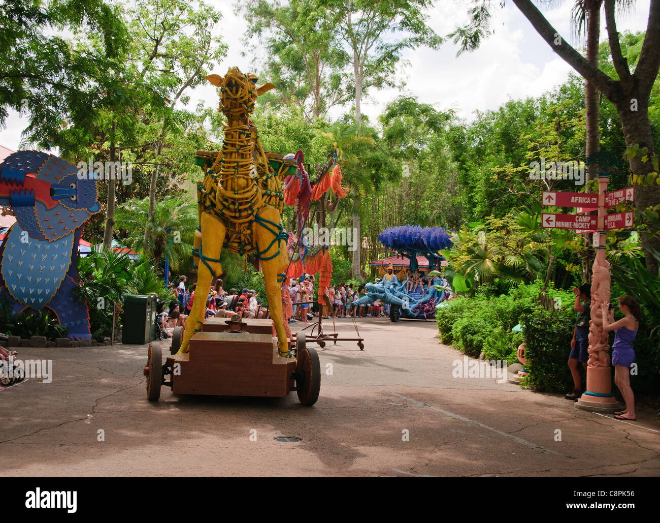 street entertainers and floats in mickeys jammin jungle parade in the ...