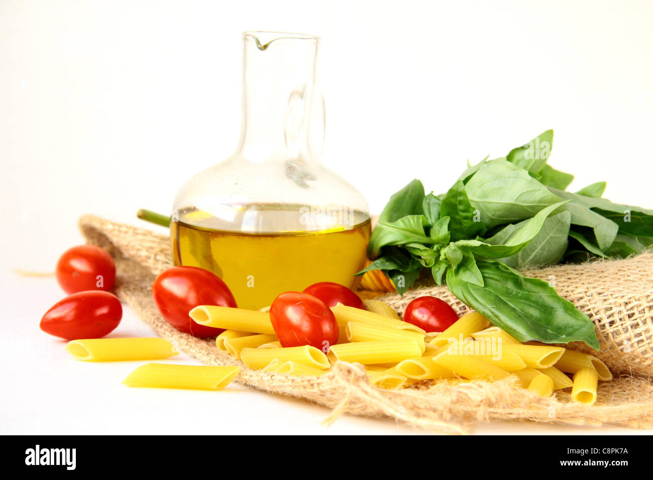 basil, pasta and olive oil - still life in the Italian style Stock ...