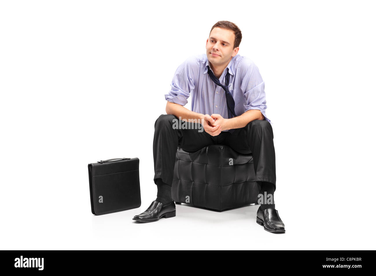 Desperate broke businessman sitting hi-res stock photography and images ...