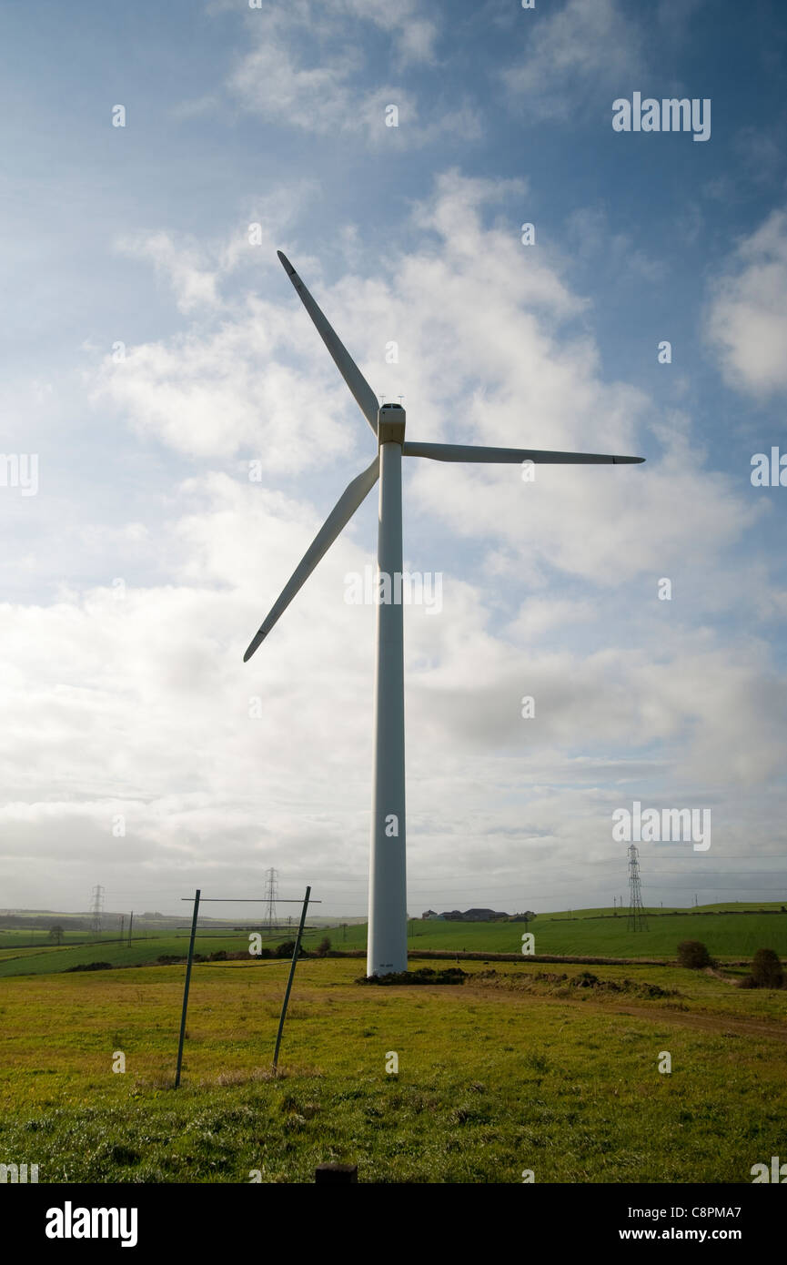A horizontal axis wind turbine sit within an agricultural landscape ...