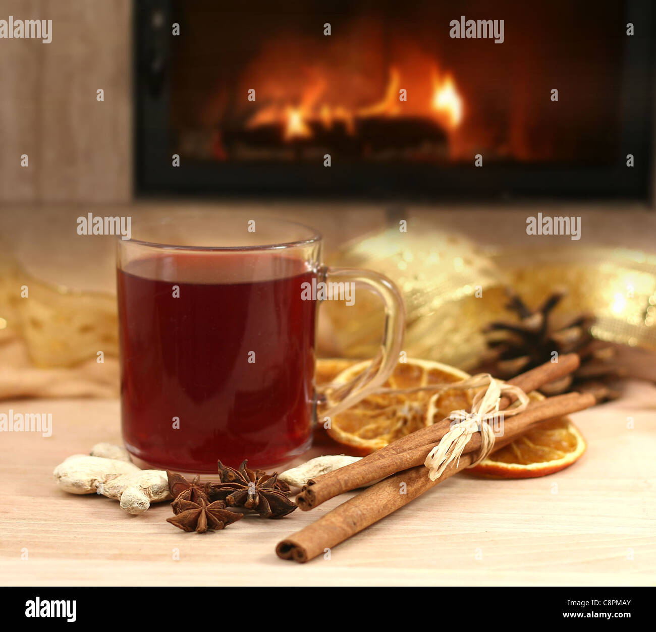 hot winter tea and background with fireplace Stock Photo - Alamy