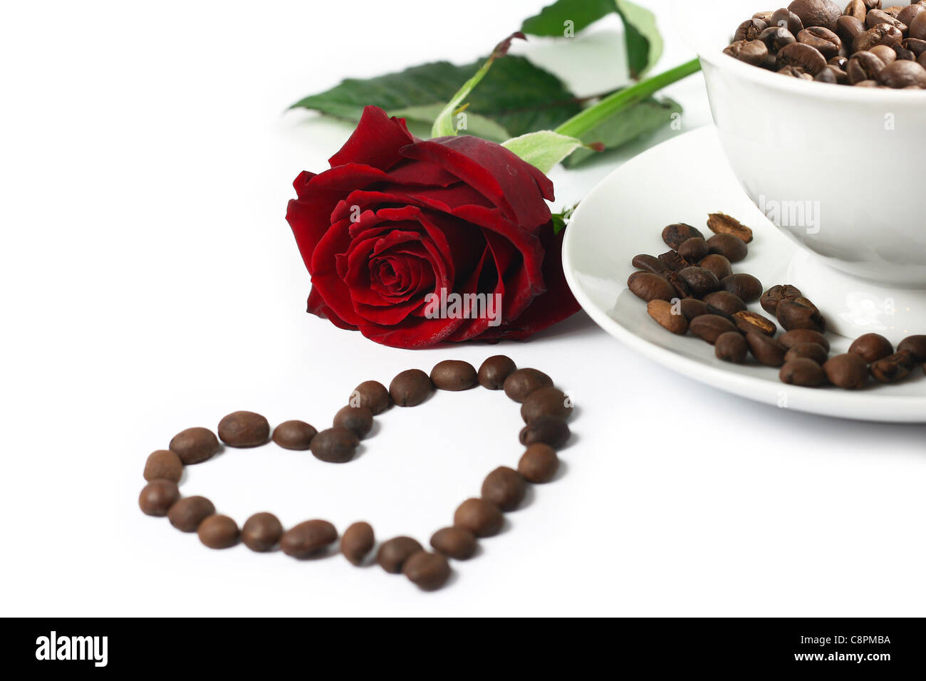 red rose and heart coffe on white background Stock Photo - Alamy