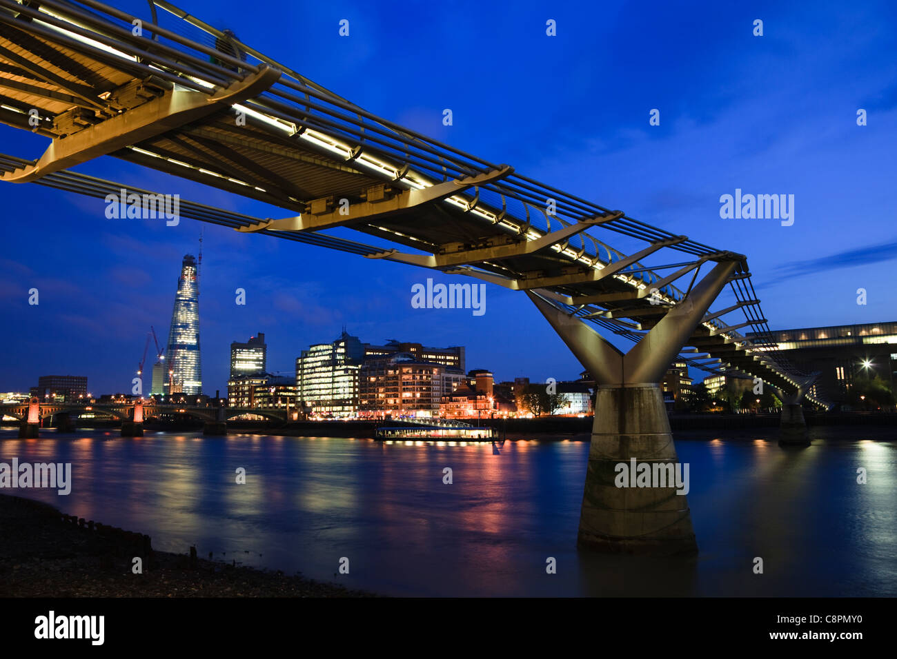 The Millennium footbridge with the Shard London Bridge and modern ...