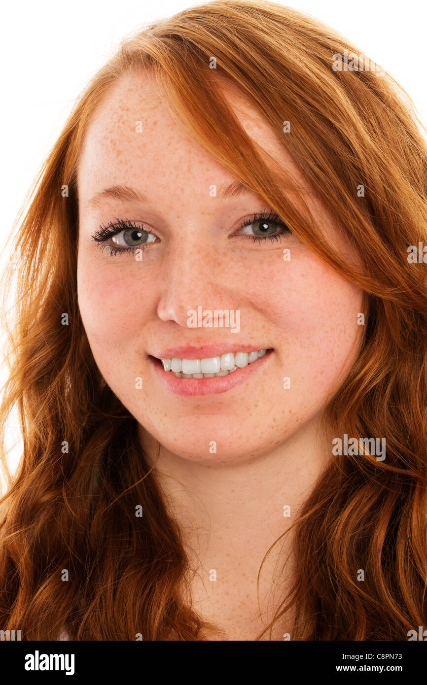 portrait of a young smiling redhead woman on white background Stock ...