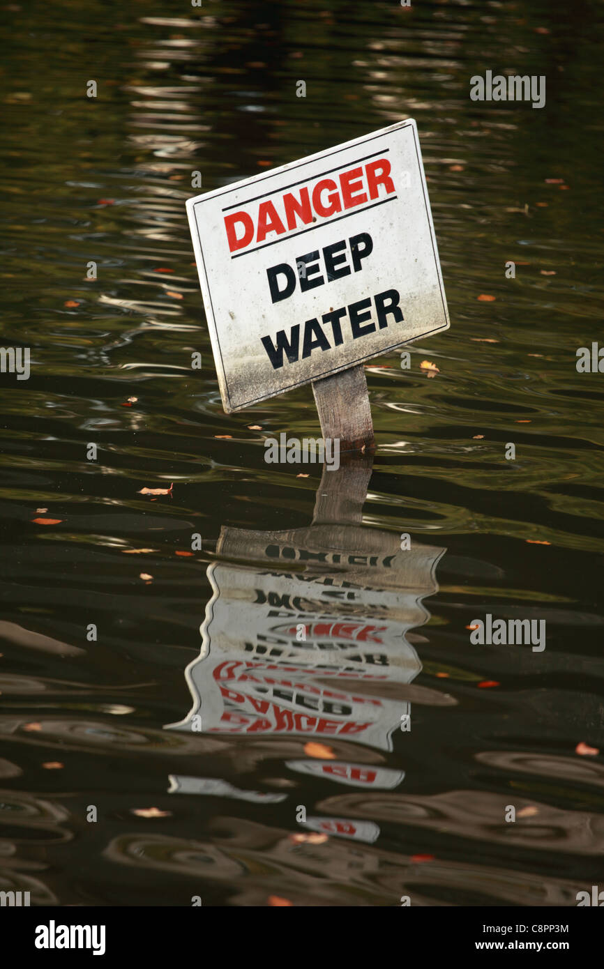 "danger deep water" sign in a pond Stock Photo - Alamy