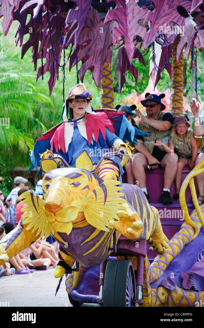 street entertainers and floats in mickeys jammin jungle parade in the ...