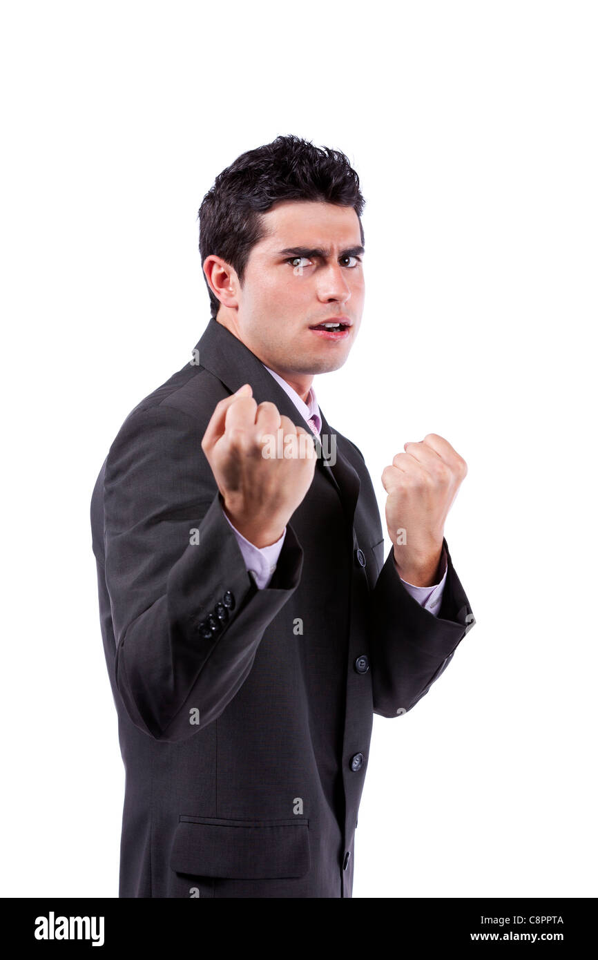 Powerful young businessman very angry with you (isolated on gray Stock ...