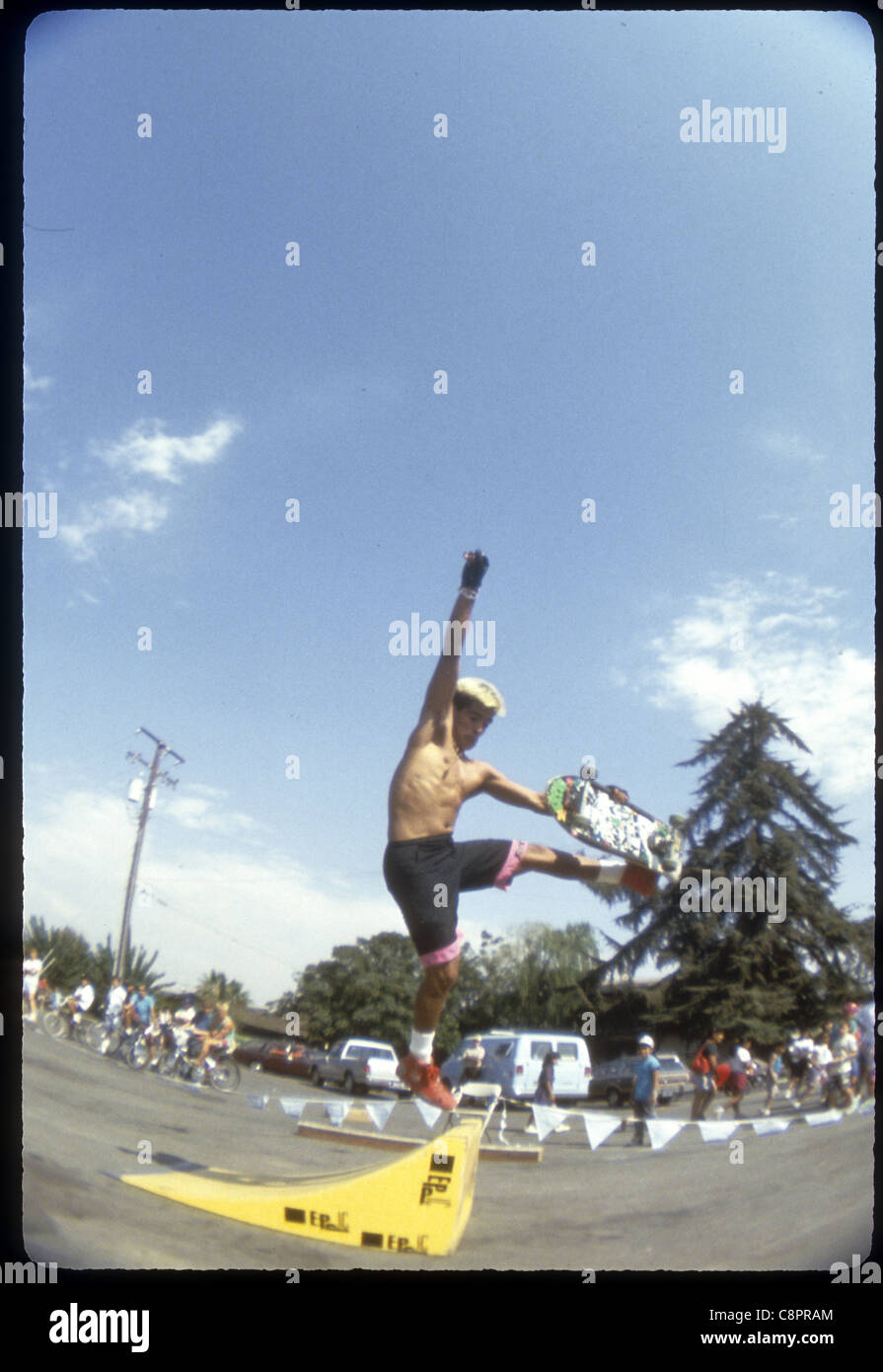 Steve Caballero jumps from a jump ramp during a street skateboarding ...