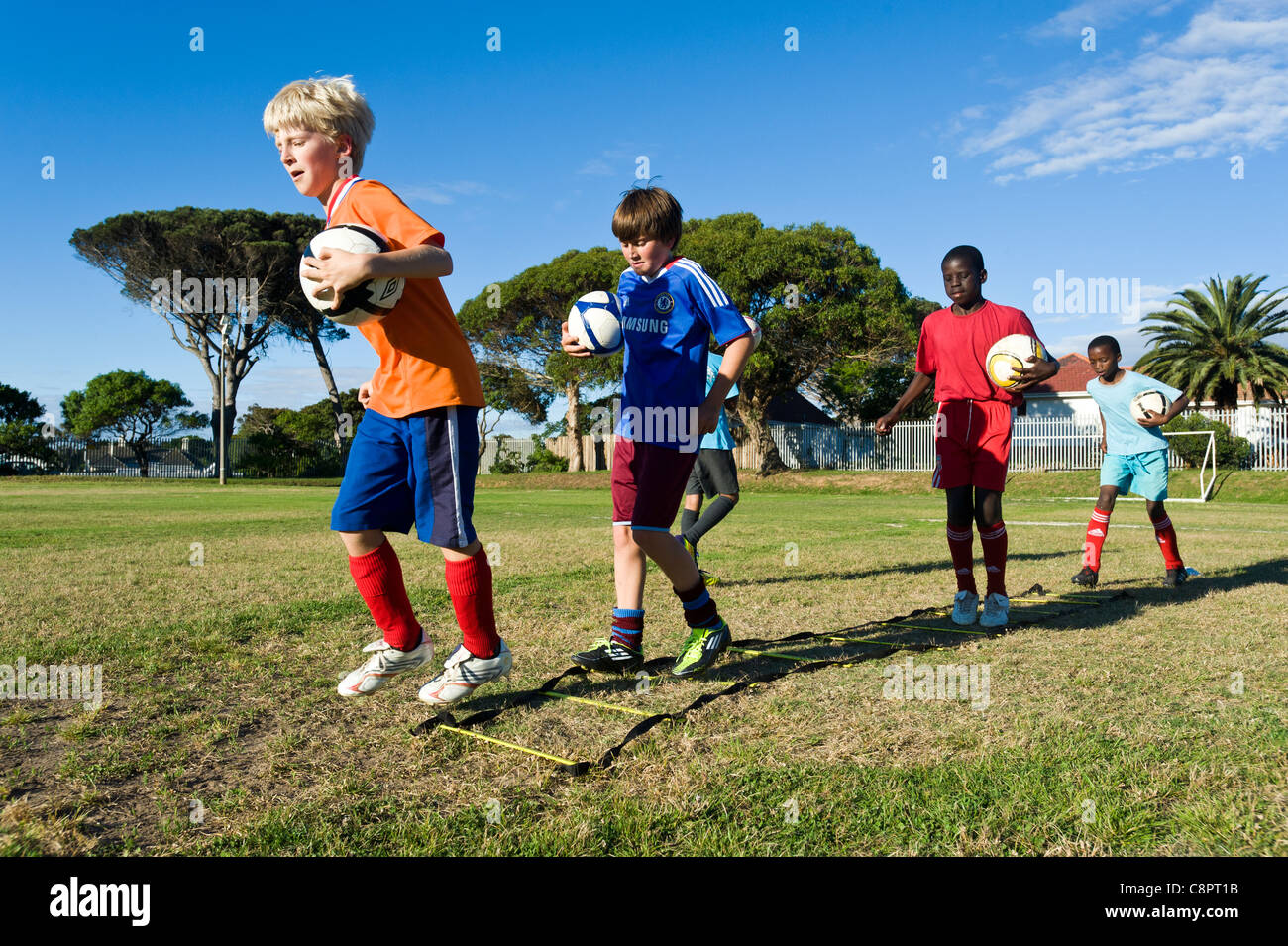 Junior football players practicing ball skills Cape Town South Africa ...