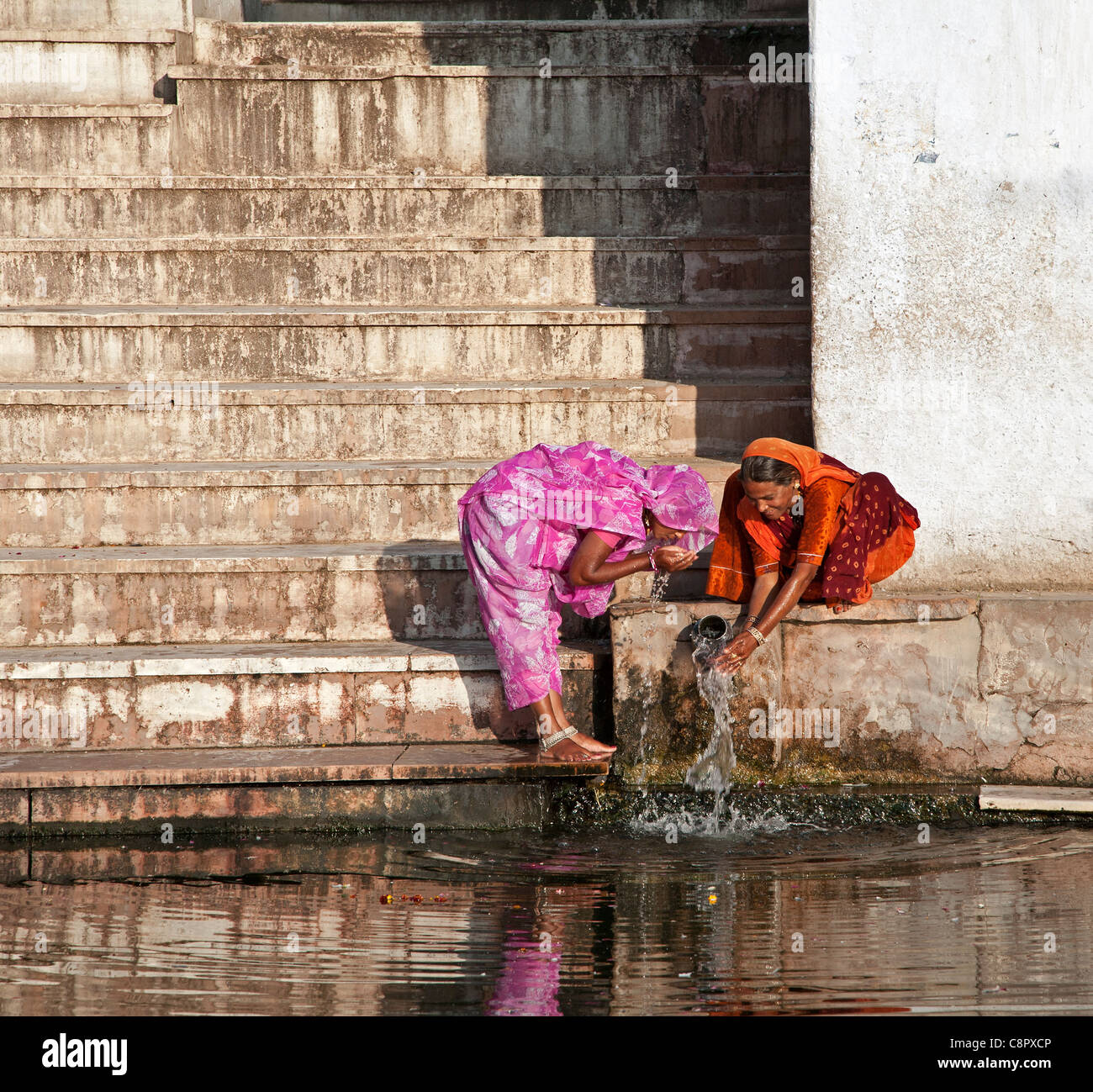 Indian woman drinking water india hi-res stock photography and images ...