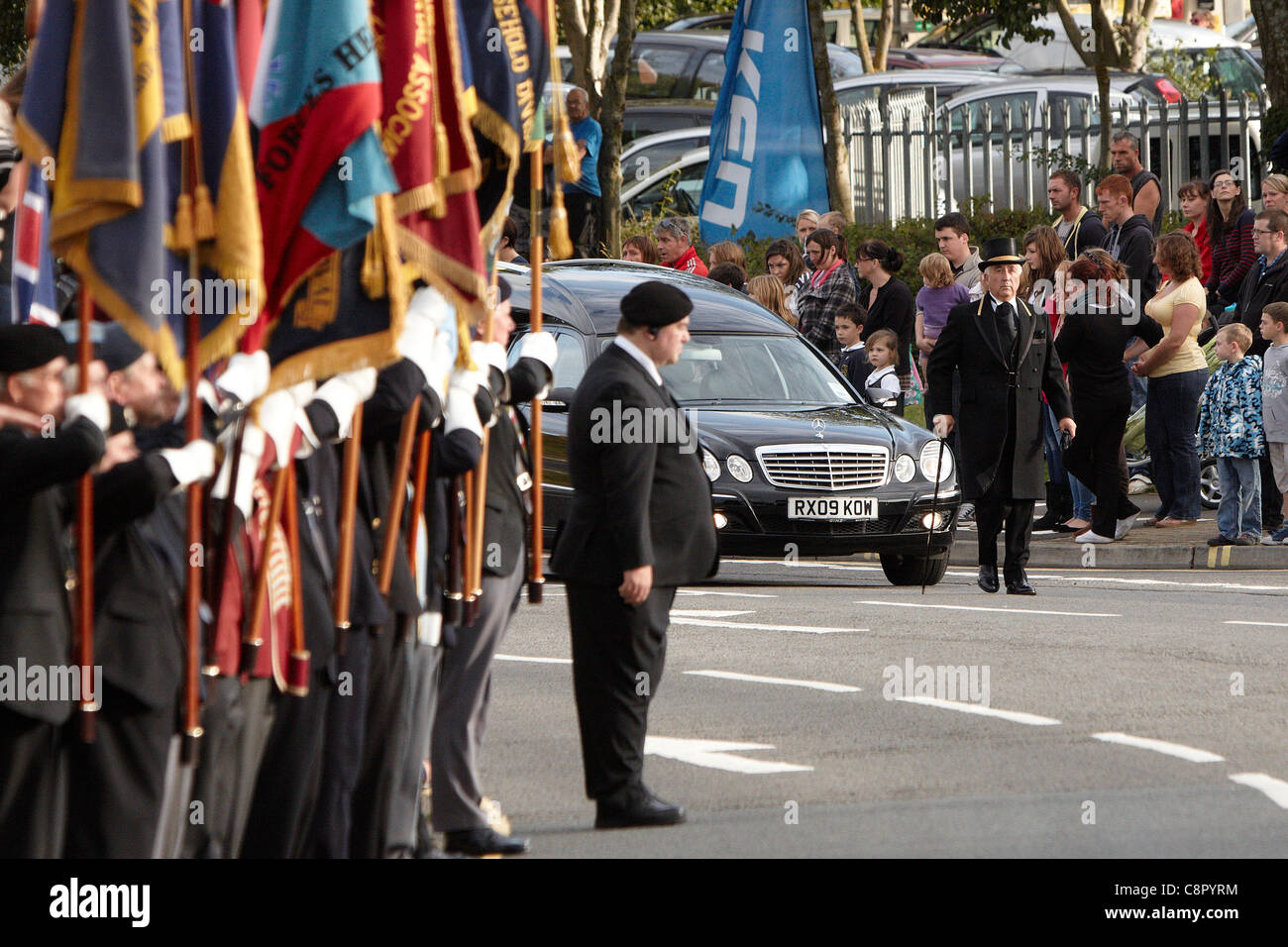 The cortege arrives at the repatriation memorial in Carterton ...