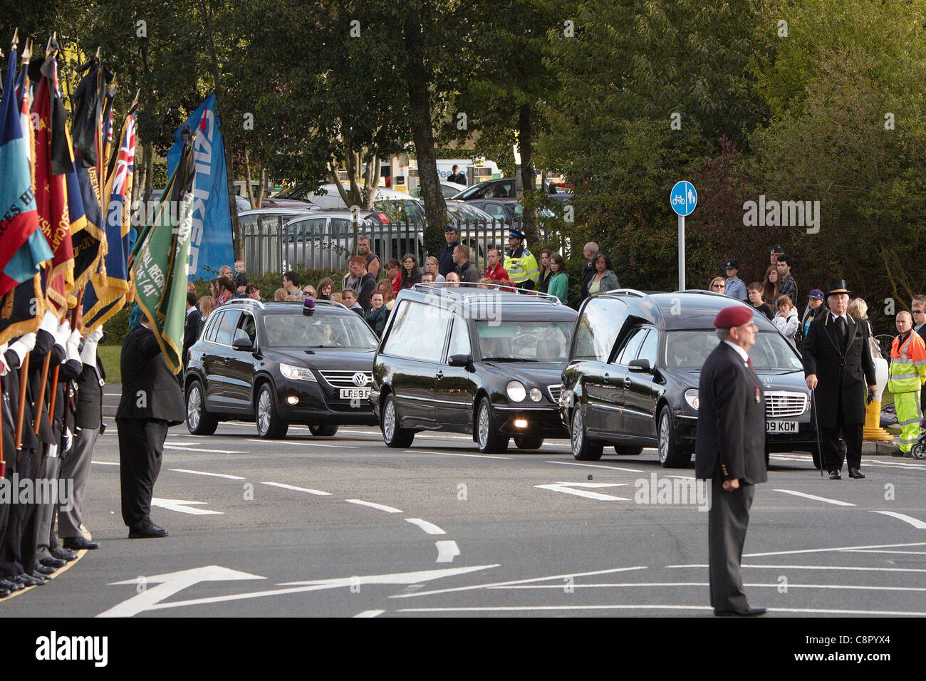 The cortege arrives at the repatriation memorial in Carterton ...