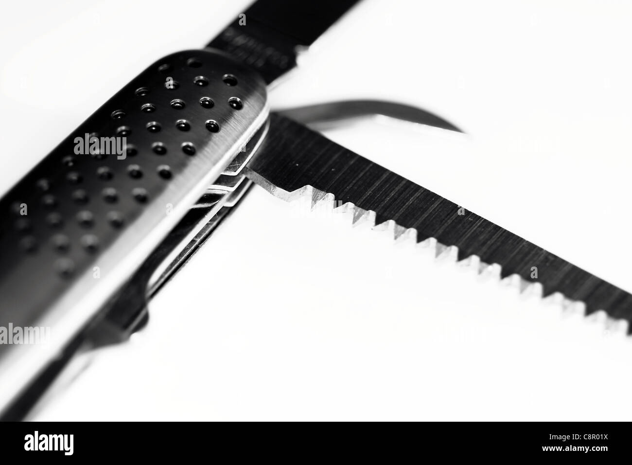 saw blade folding knife Stock Photo - Alamy