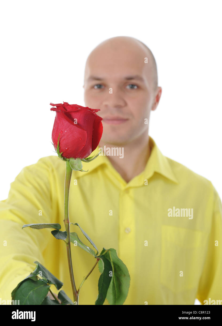 man holding a red rose Stock Photo - Alamy