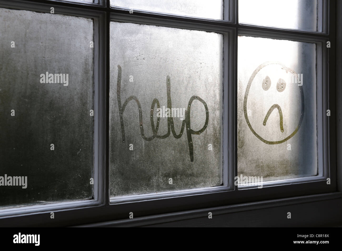 word help written on a window by a child Stock Photo - Alamy