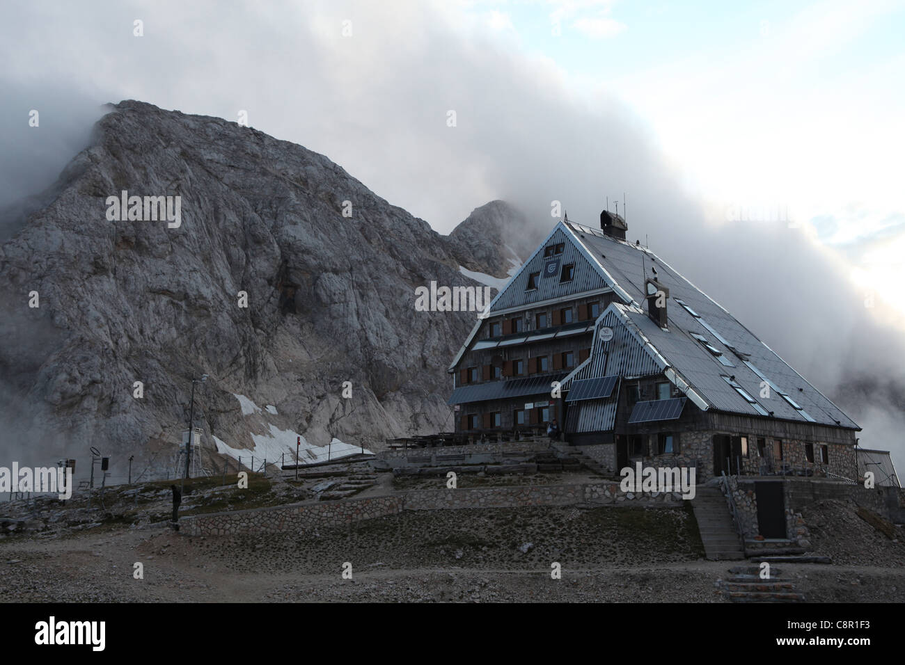Triglavski dom mountain hut (2,515 m) at the foot of Mount Triglav ...