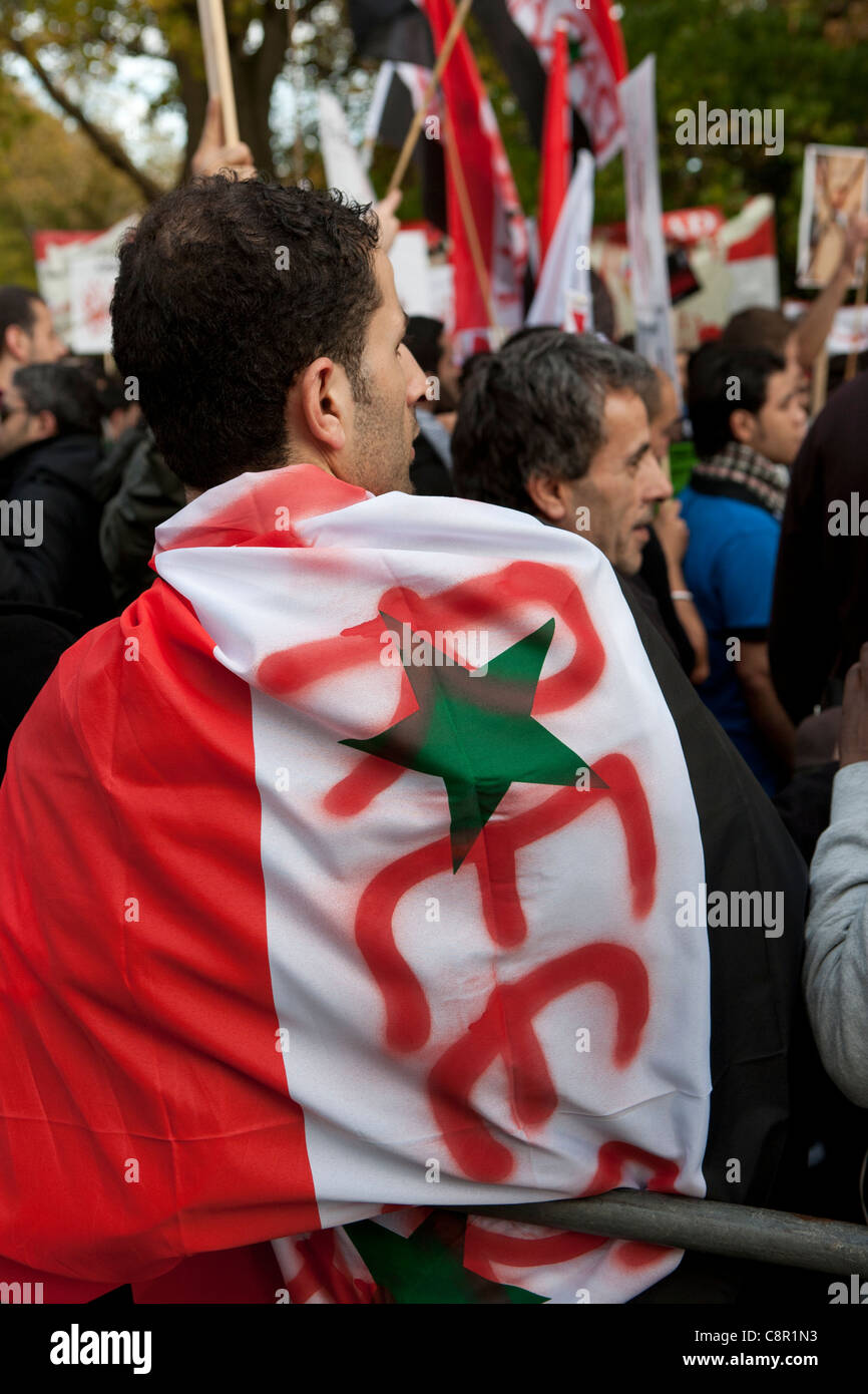 Protesters protest outside the Syrian Embassy in London Stock Photo - Alamy
