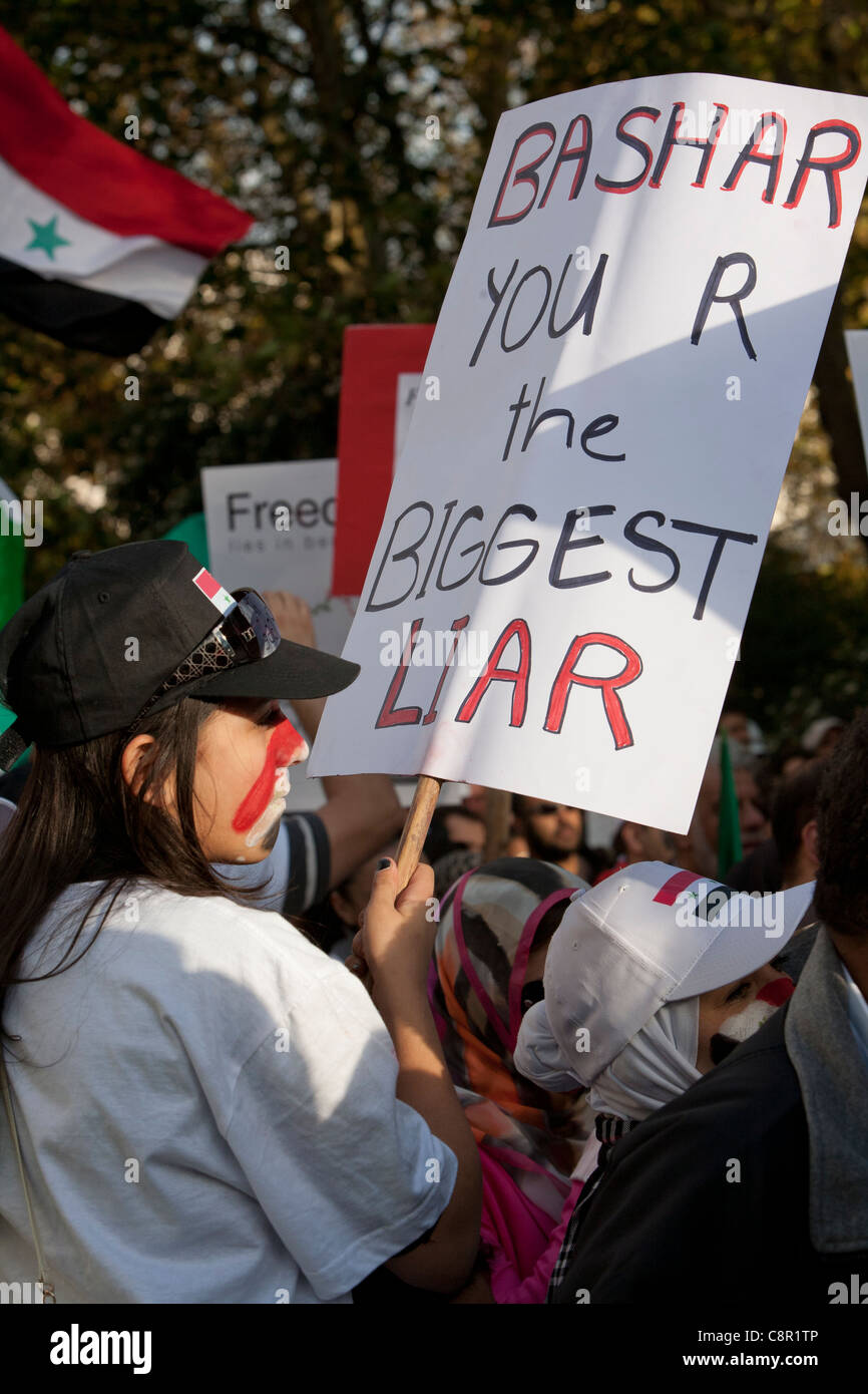 Protesters protest outside the Syrian Embassy in London Stock Photo - Alamy