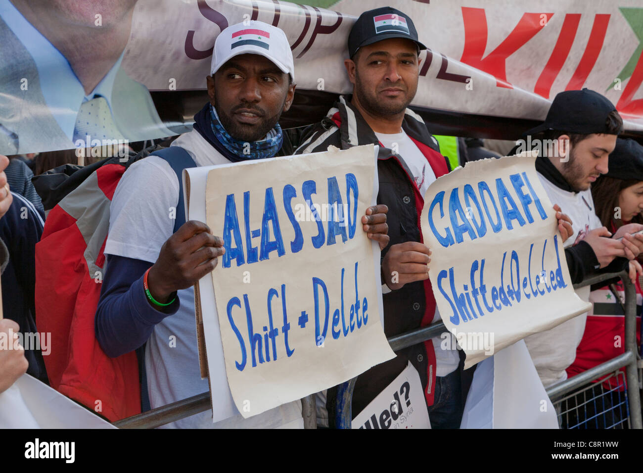 Protesters protest outside the Syrian Embassy in London Stock Photo - Alamy